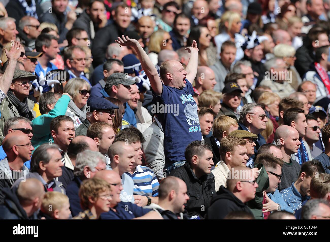 Crewe alexandra fans cheer on their side in the stands hi-res stock ...