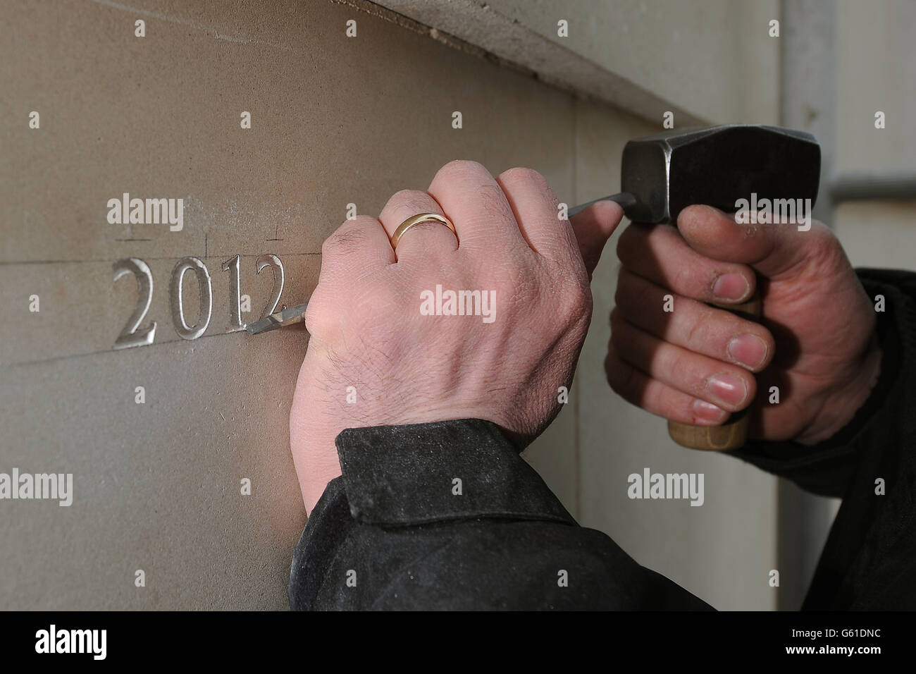 Nick Hindle prepares to engrave the names of UK Servicemen and women ...