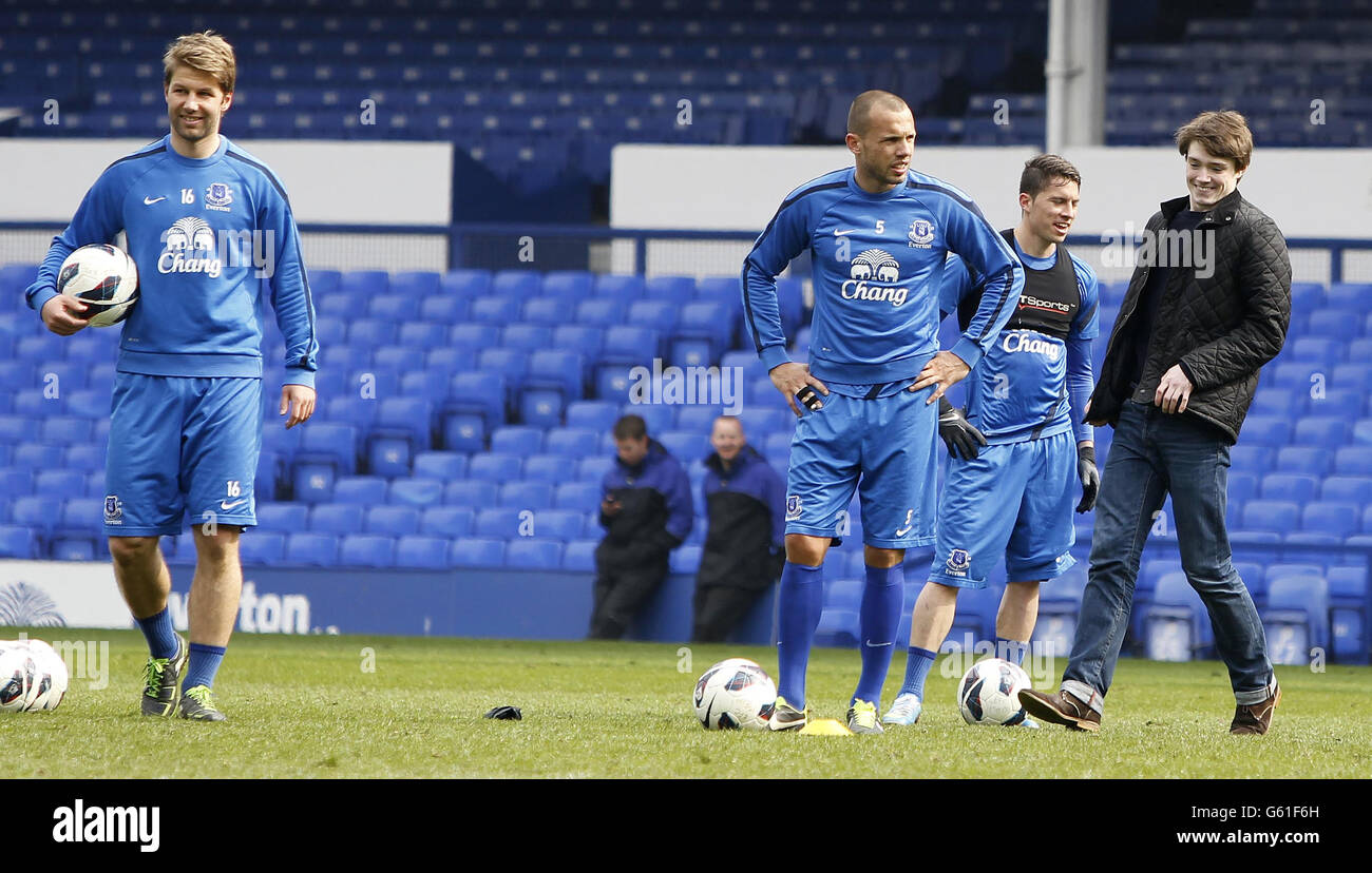 Everton fans join in during the open training day at Goodison Park ...