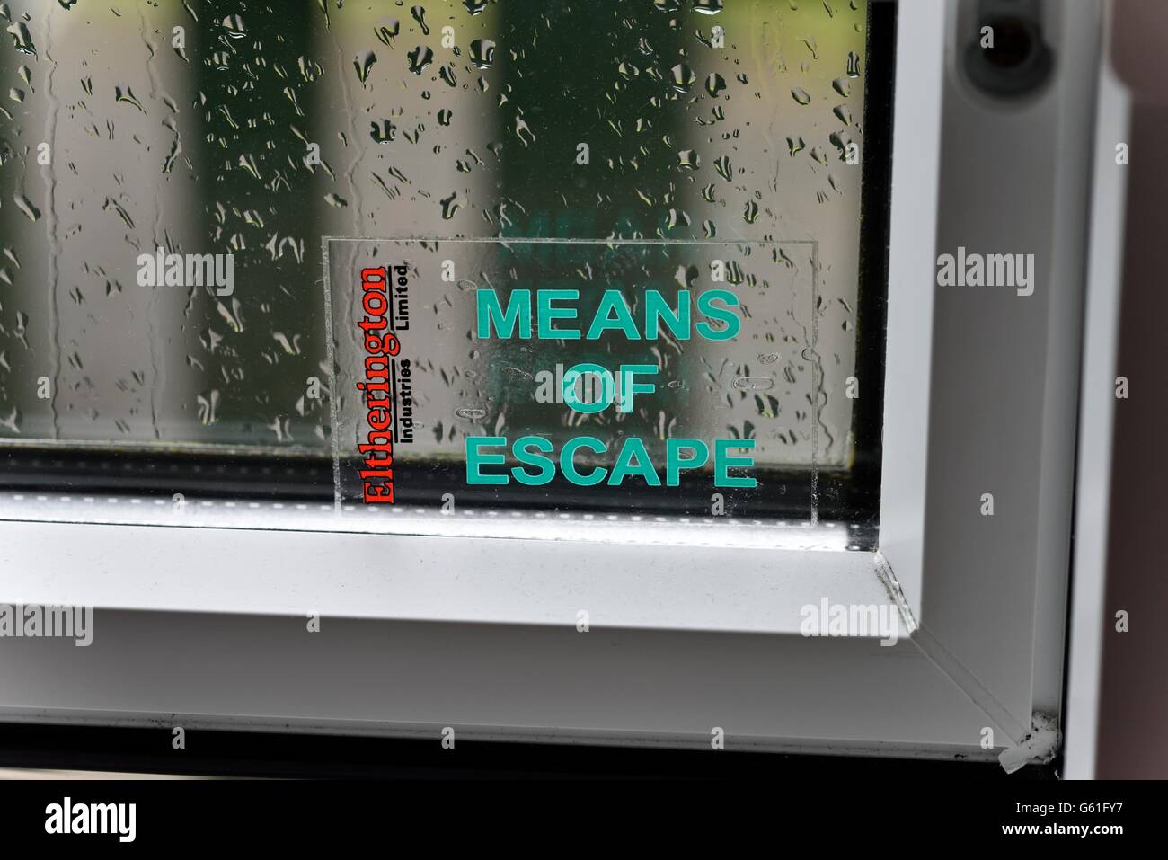 Means of escape sticker inside a caravan window Stock Photo - Alamy