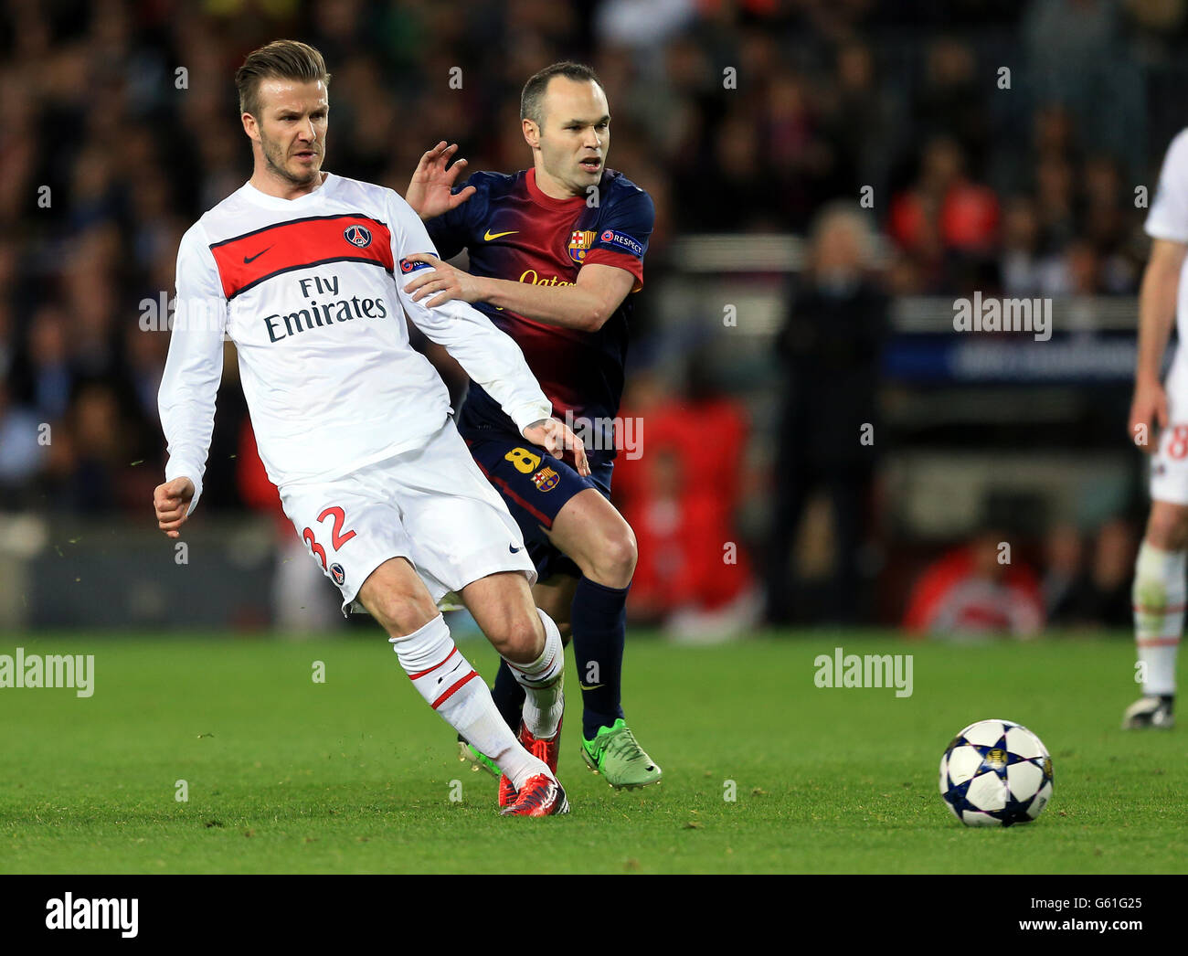 Barcelona's Andres Iniesta and Paris Saint Germain's David Beckham ...