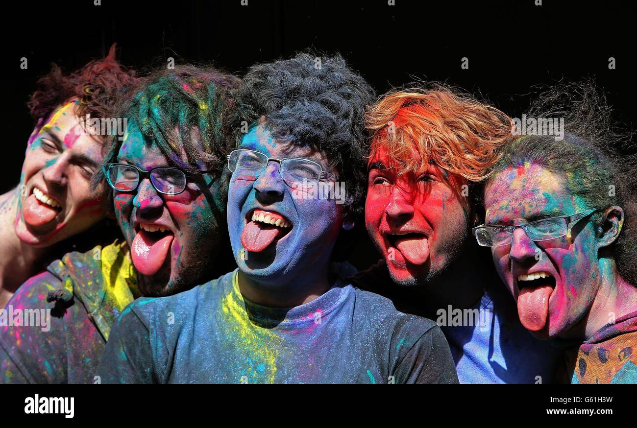 Partygoers covered in multicoloured chalk dust in central Dublin ...