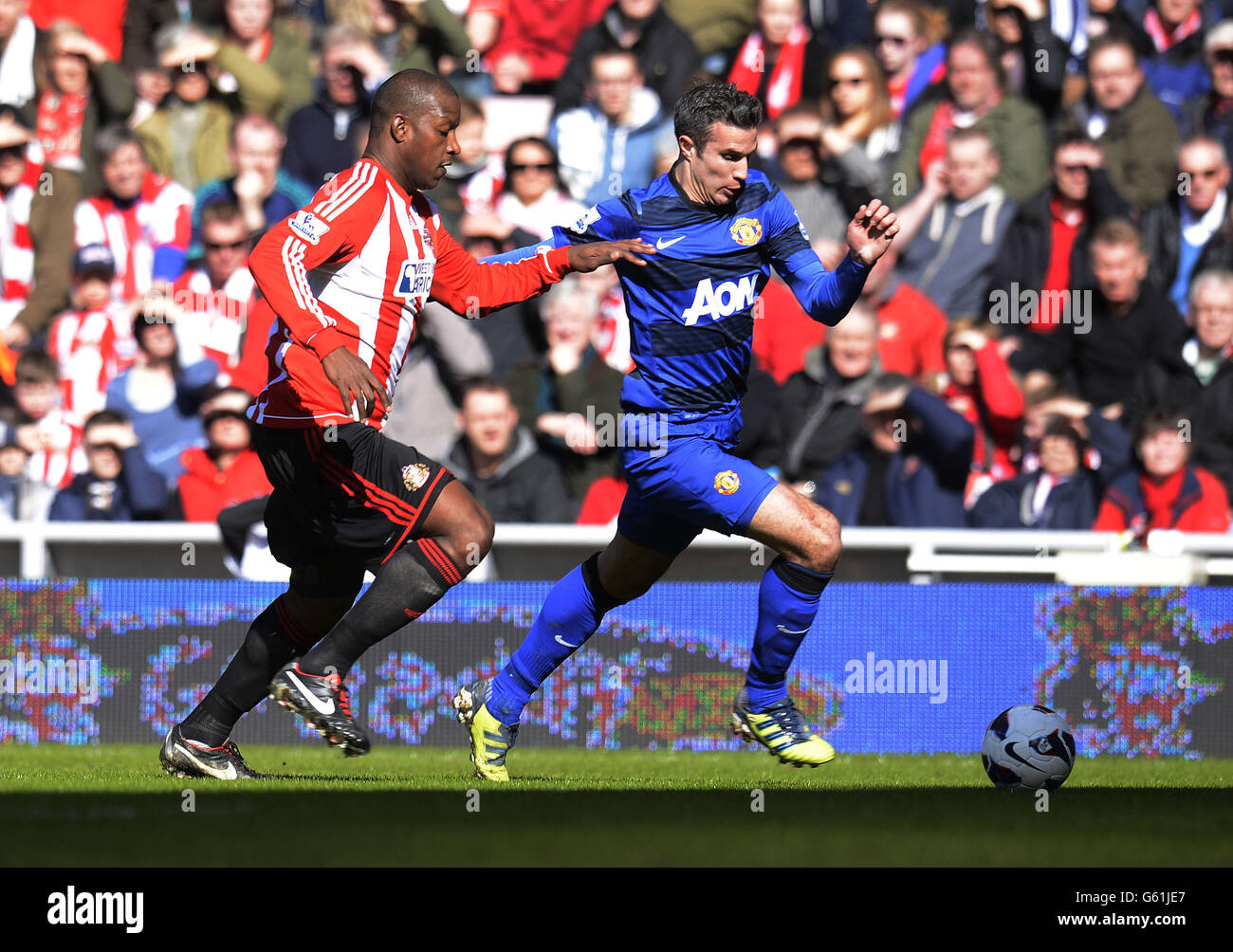 Manchester United's Robin Van Persie and Sunderland's Titus Bramble ...