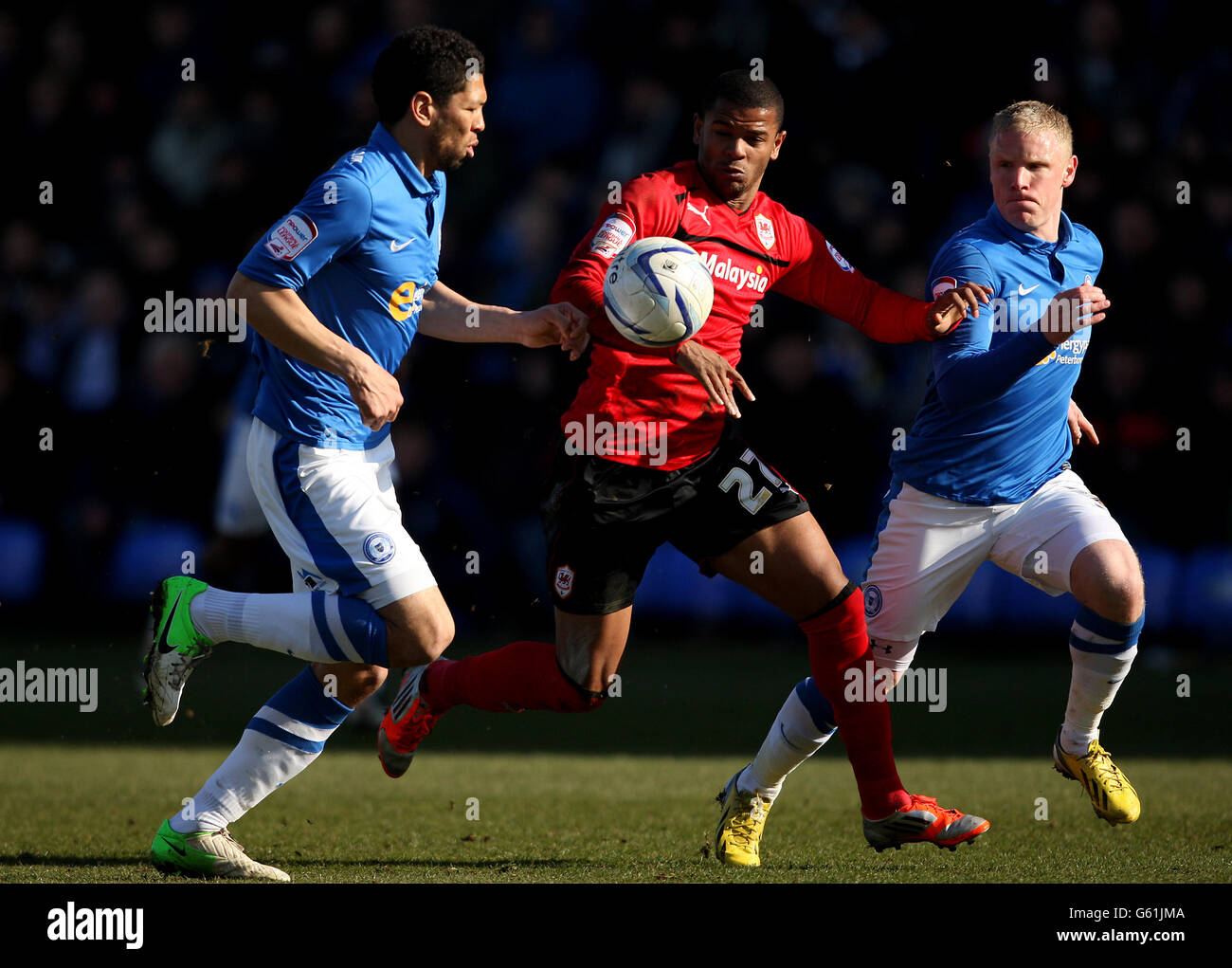 Peterborough's Nathaniel Knight-Percival (left) and Craig Alcock (right ...