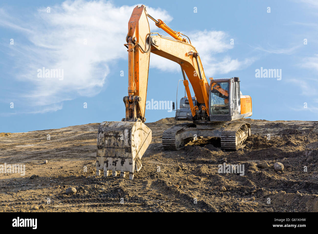 Heavy duty construction equipment parked at work site Stock Photo - Alamy