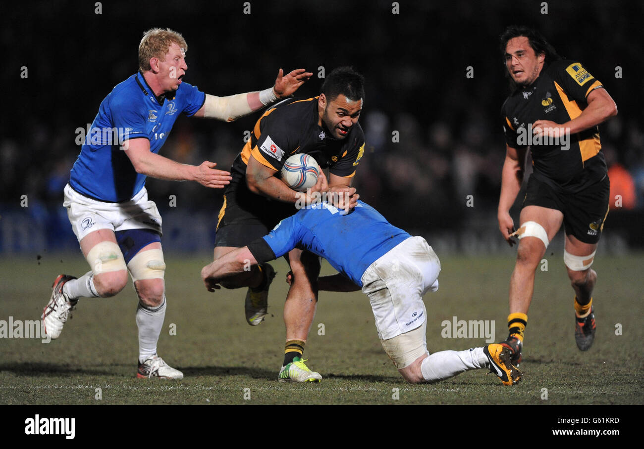Wasps Billy Vunipola is tackled by Leinster's Leo Cullen (left) and ...