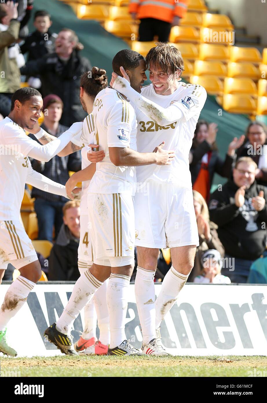 Swansea City's Miguel Michu (right) celebrates scoring their first goal ...
