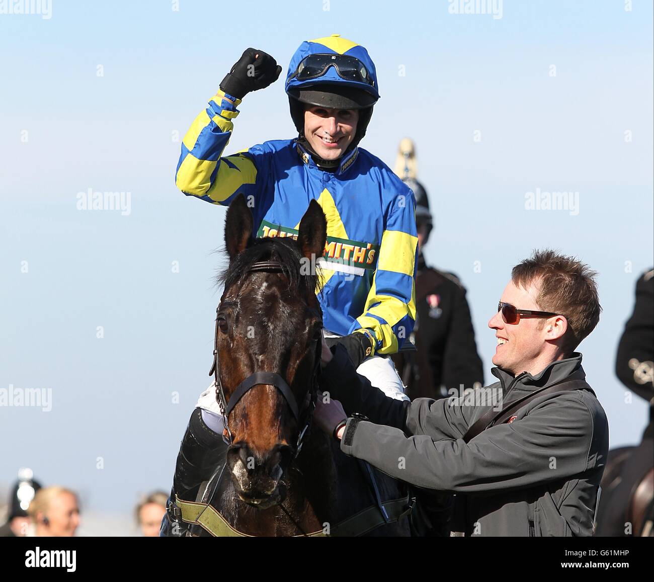 Ryan Mania celebrates on Auroras Encore after winning the John Smith's ...