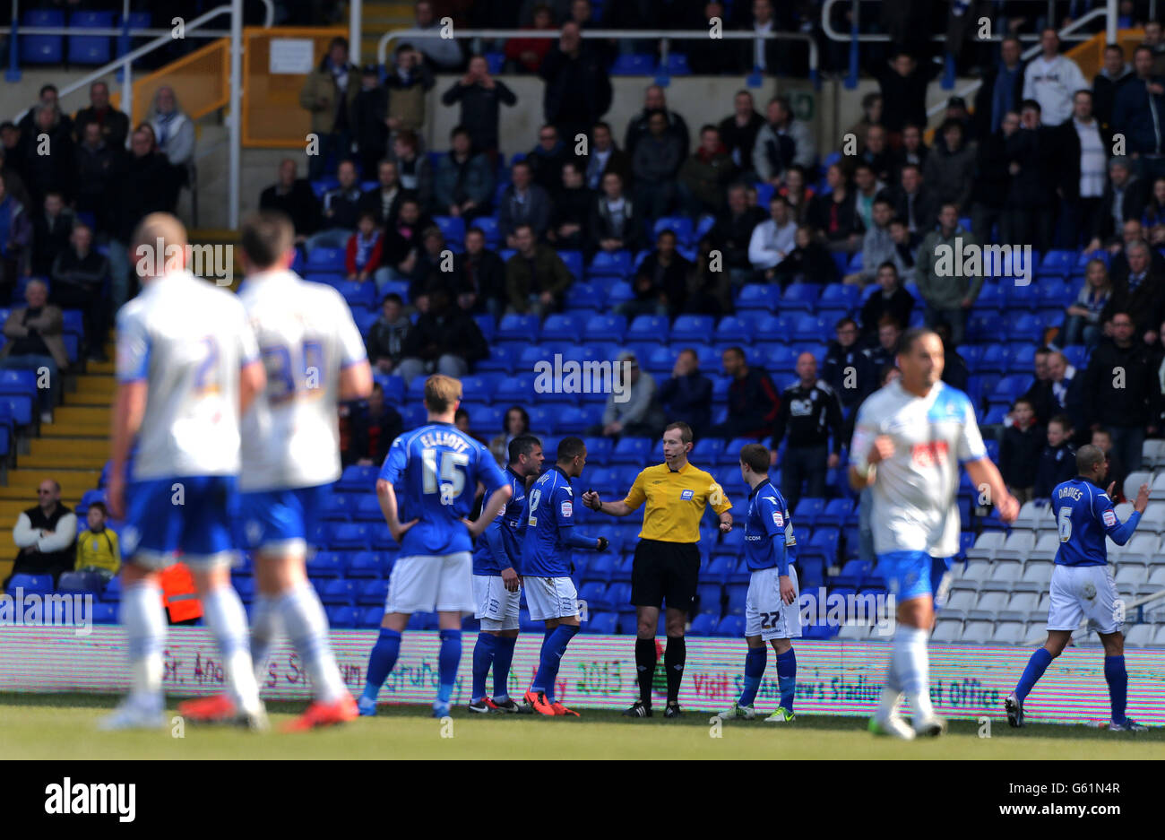 Referee Keith Hill talks to Birmingham City players after his original ...