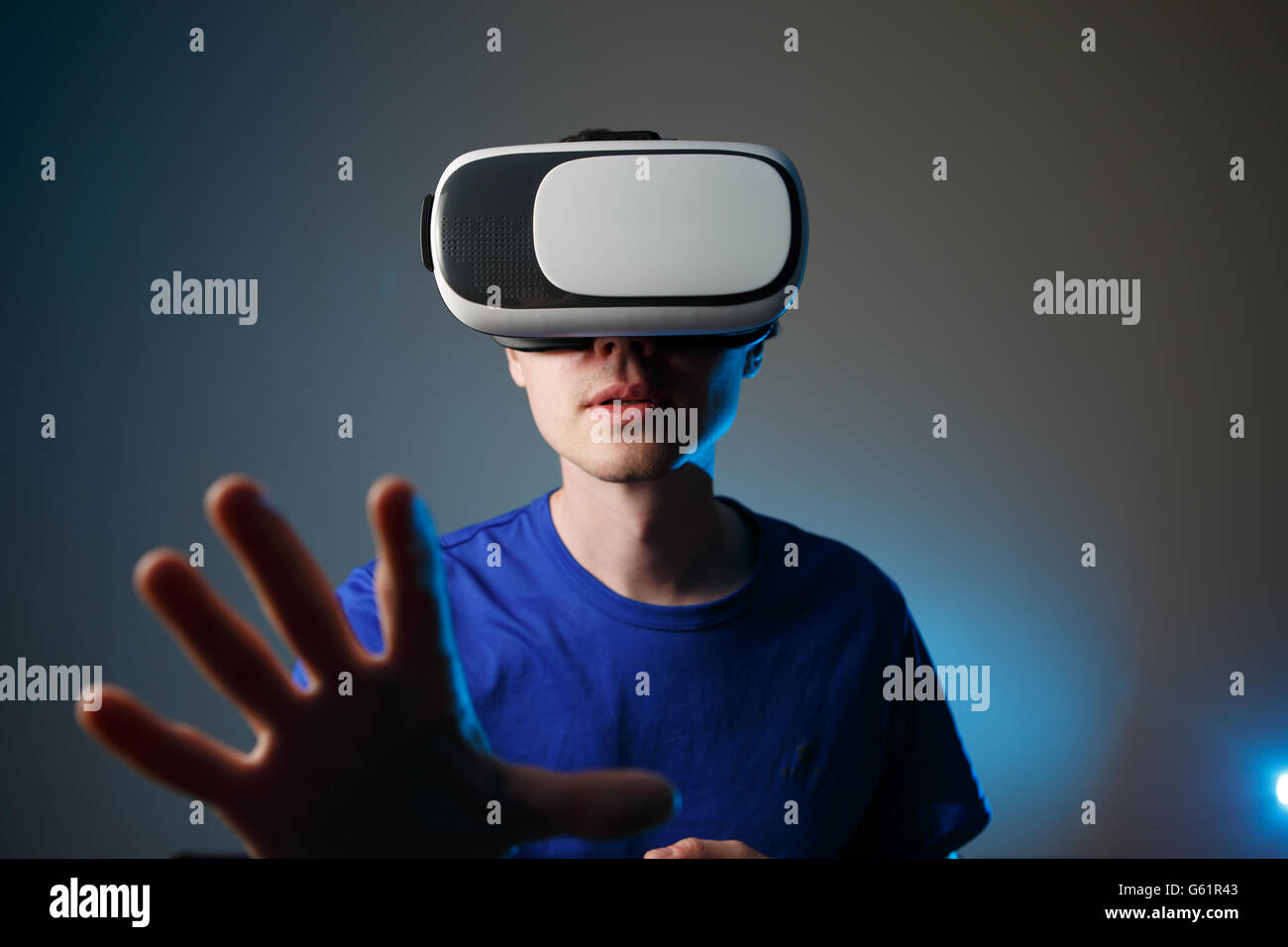Man wearing virtual reality goggles Stock Photo - Alamy