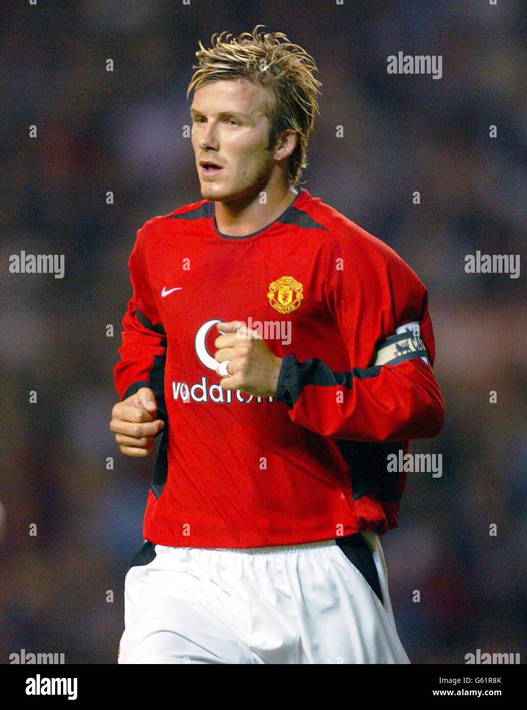 Manchester uniteds david beckham in action hi-res stock photography and ...