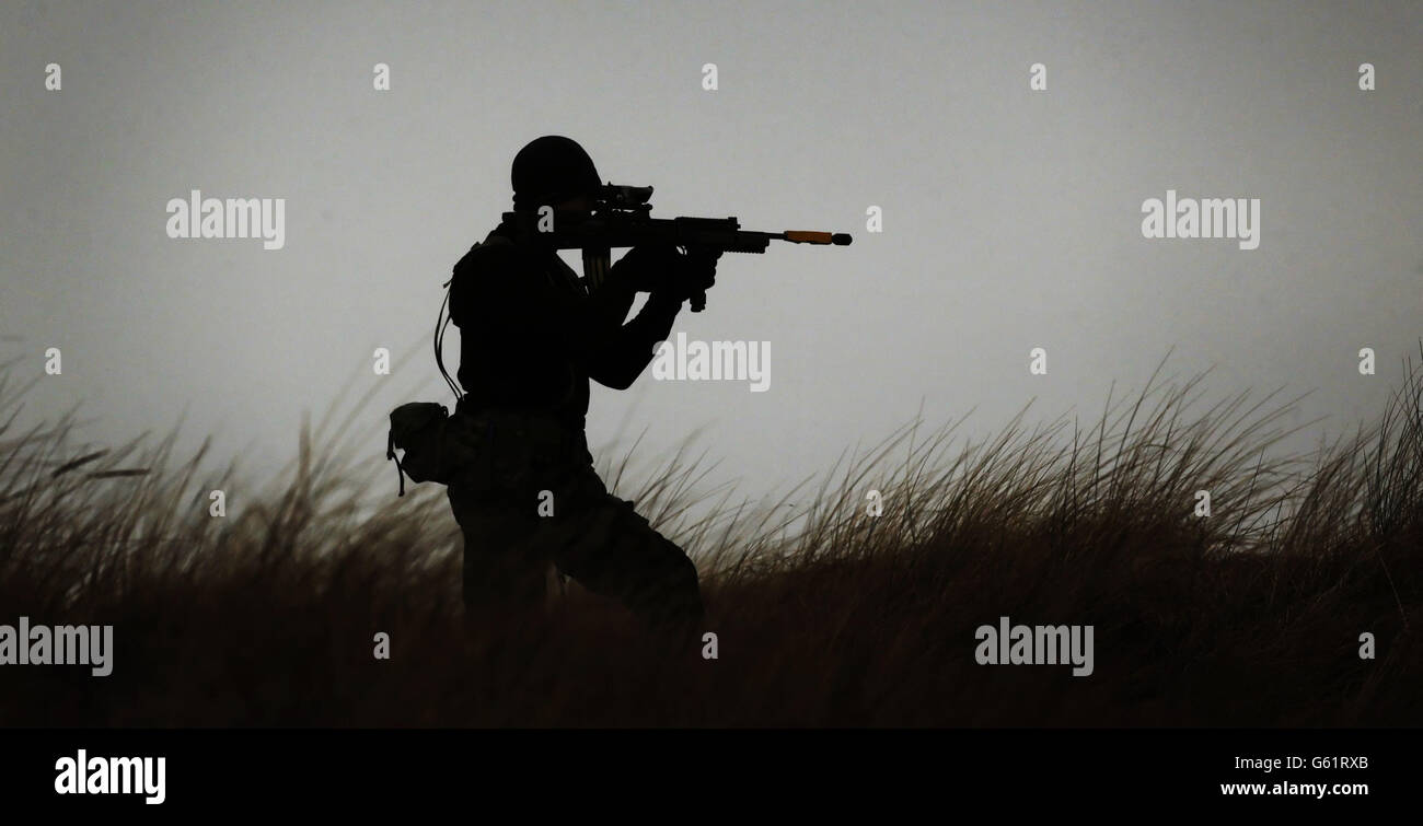 A members of 45 Commando Royal Marines prepares ahead of exercise Joint ...