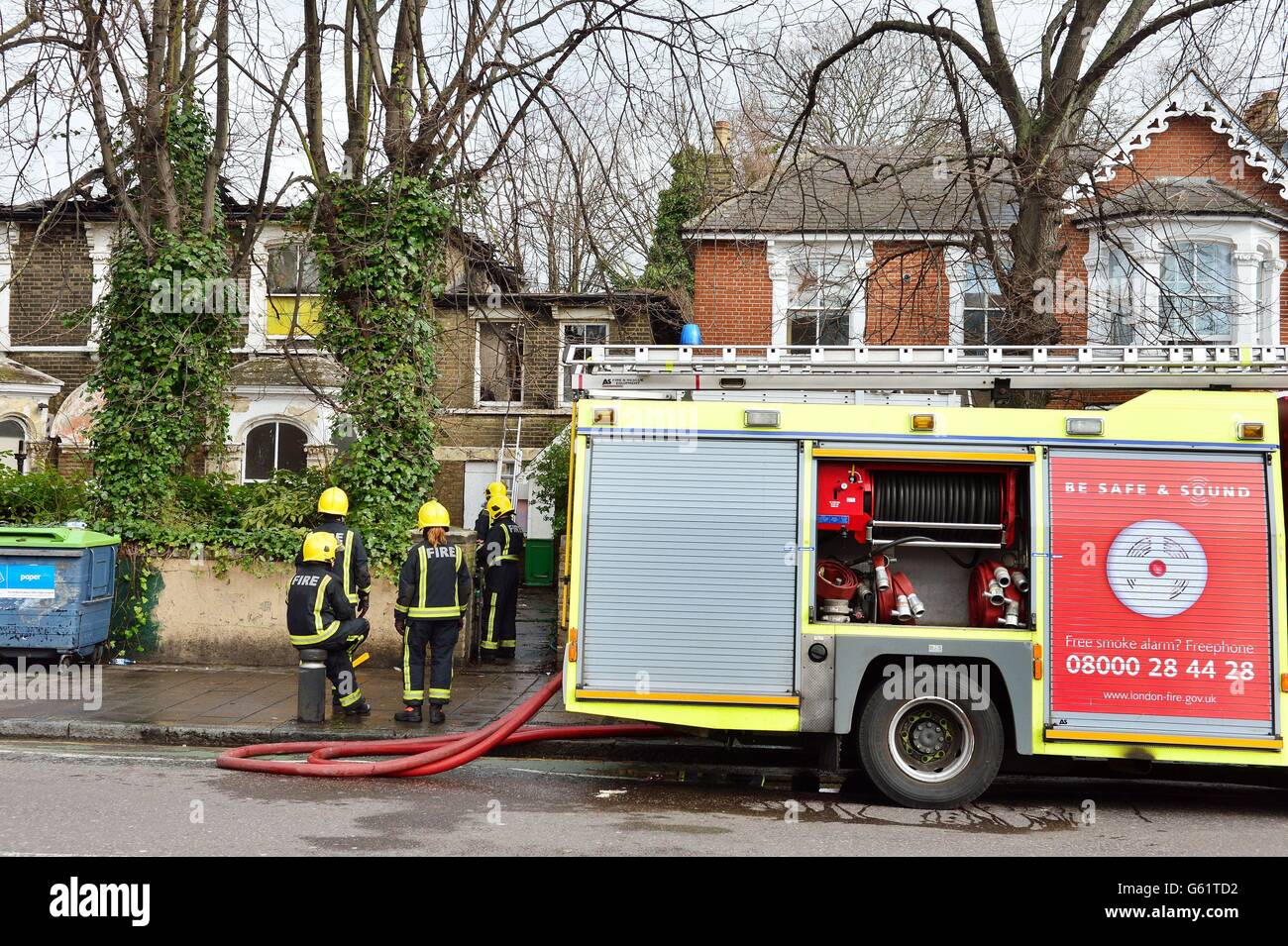 Firefighters outside the remains of a house in Romford Road, Forest ...