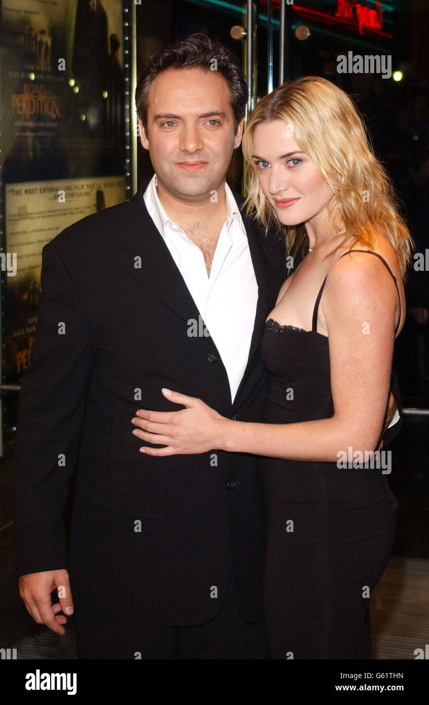 Director Sam Mendes and actress Kate Winslet arriving at the Empire ...