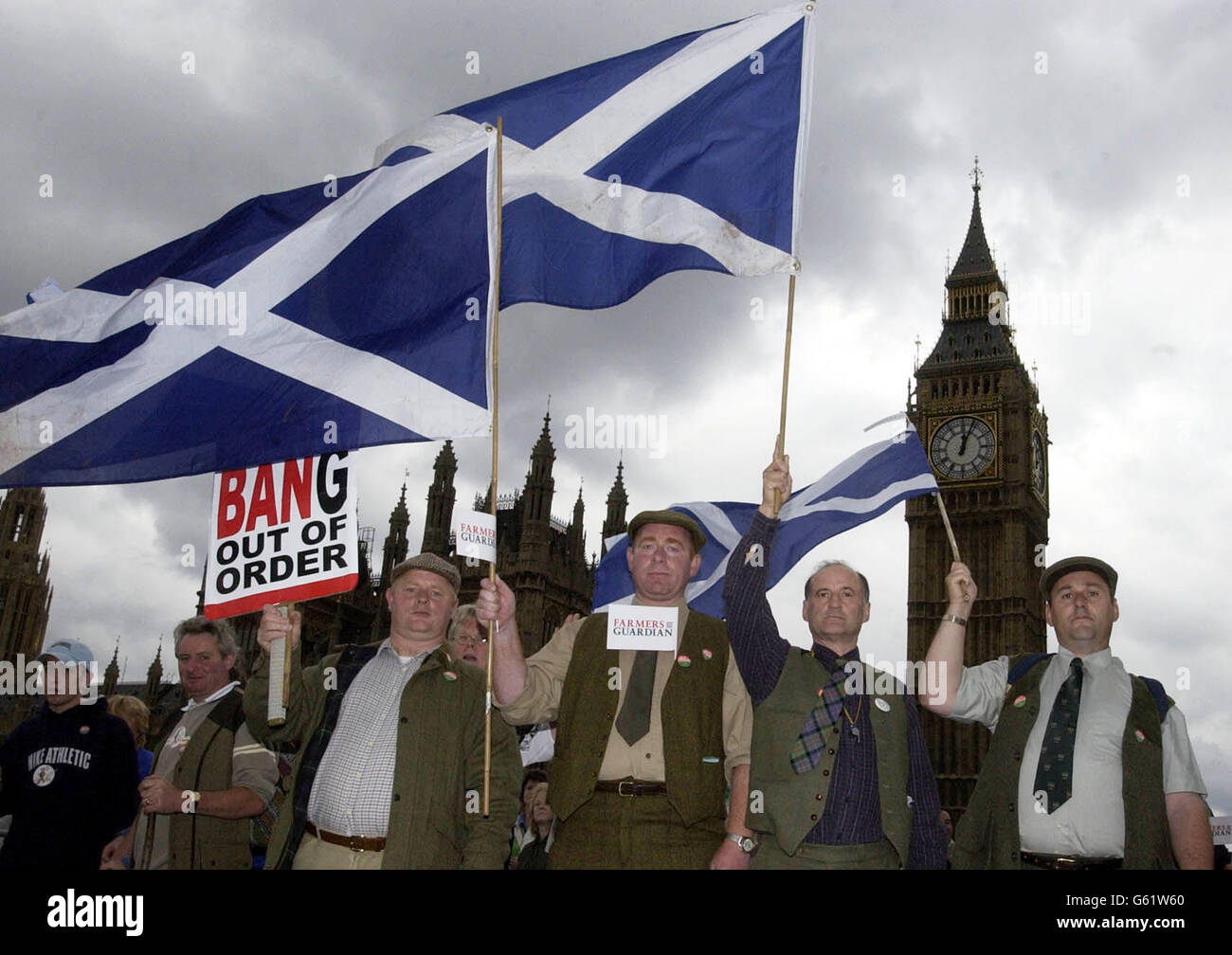 Farmers from West Lothian holding sign and flags (L to R) James ...