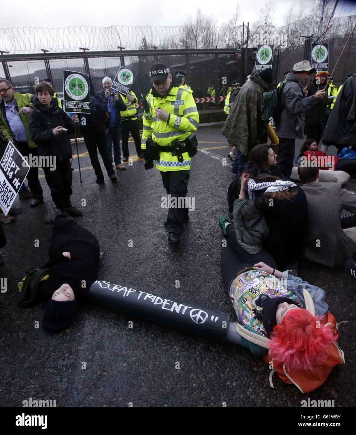 Protesters blockade Faslane Naval Base in Scotland during an anti ...