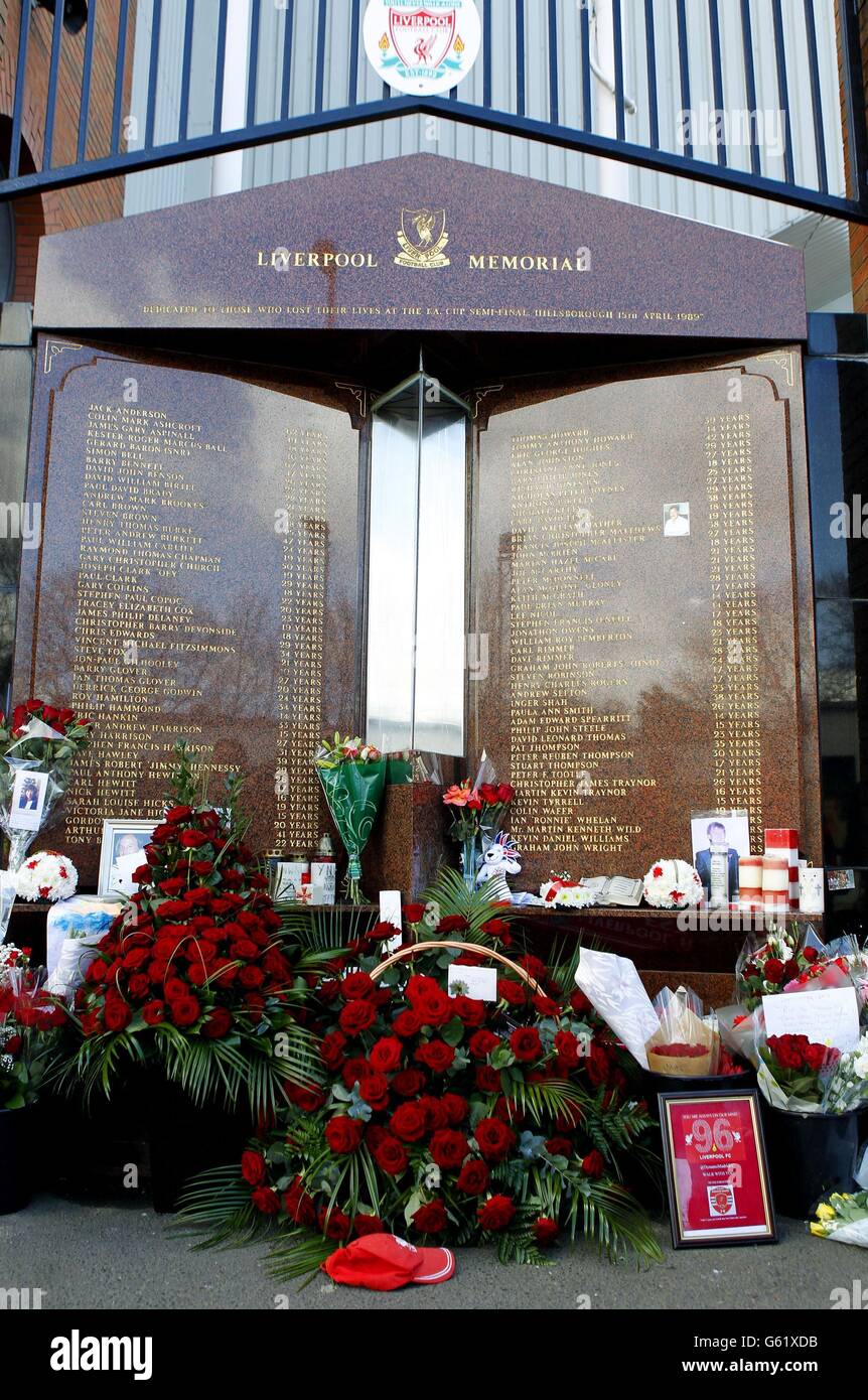 Flowers are left against the Hillsborough disaster memorial at Anfield ...