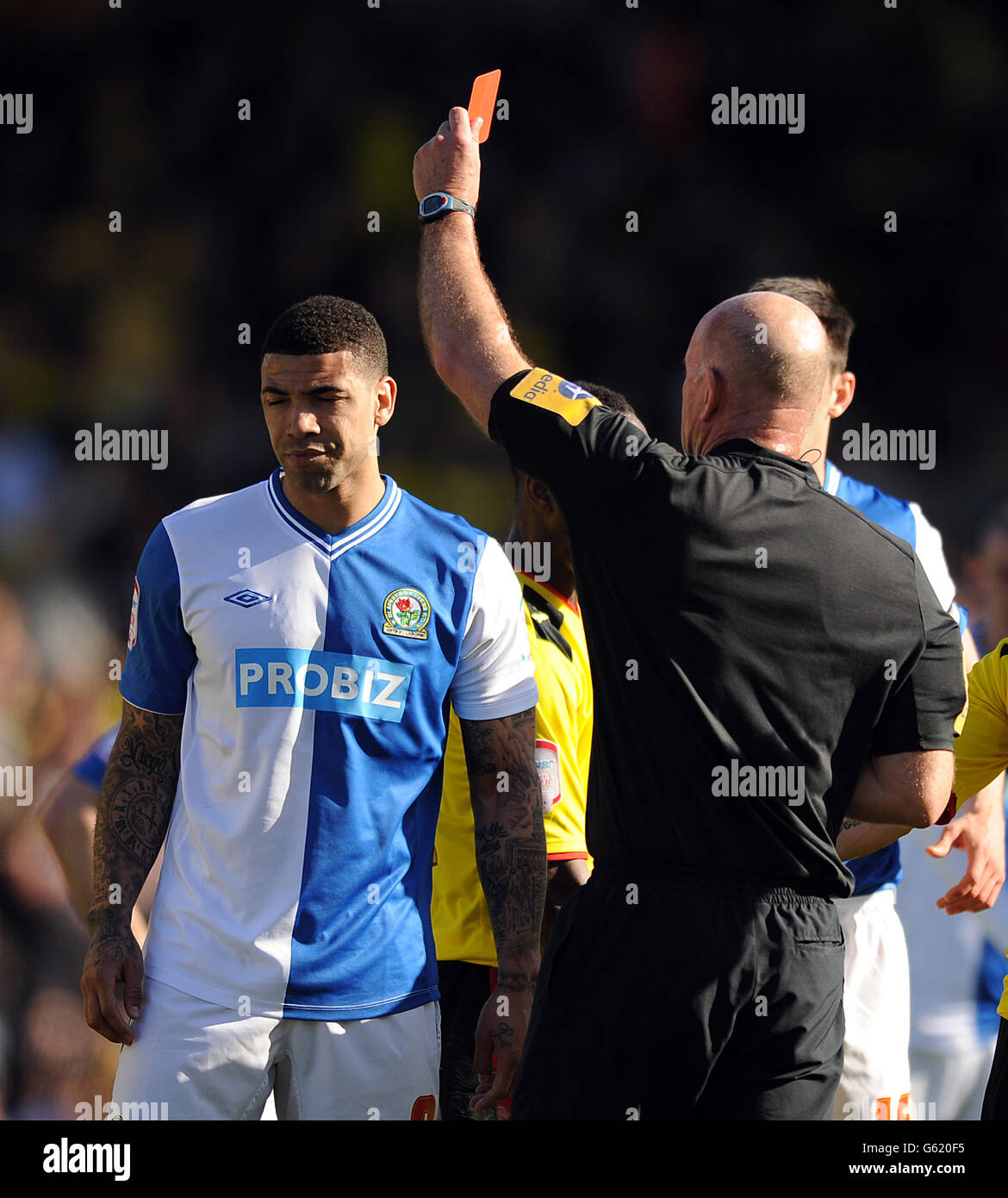 Blackburn Rovers' Leon Best is shown the red card by referee Nigel ...