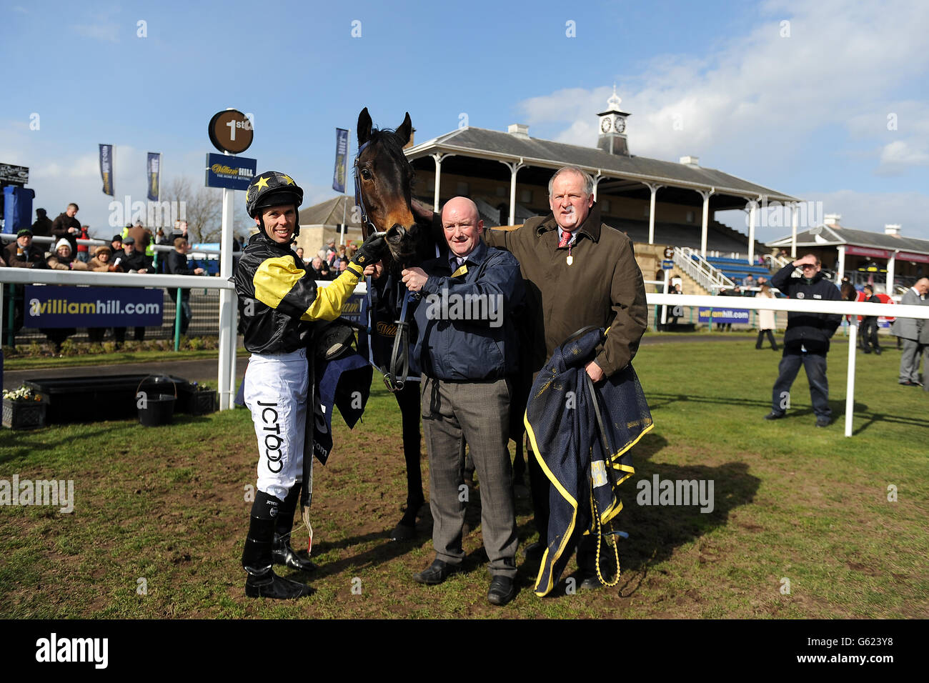 Jockey Graham Lee (left) in the winners enclosure after victory on Jack ...