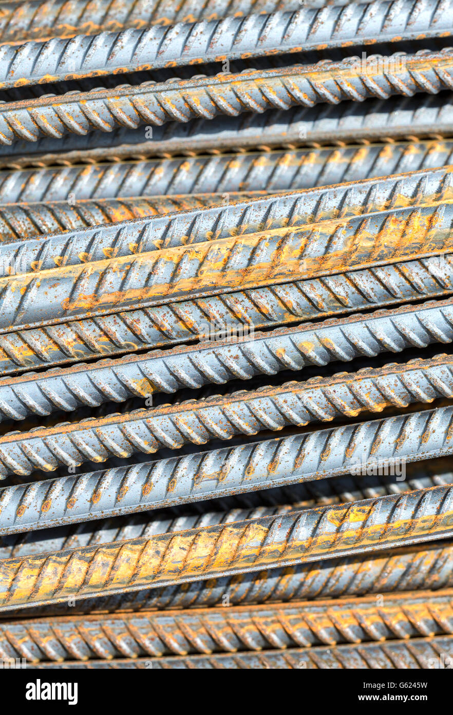 Stack of steel rebars for reinforcing concrete on construction site ...