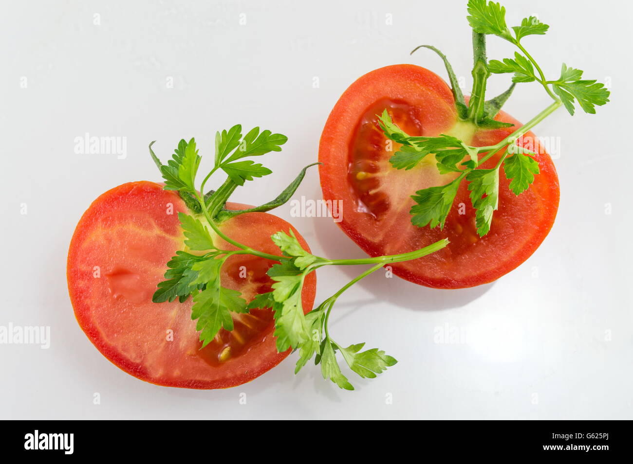Tomato slice sliced half tomatoes hi-res stock photography and images ...