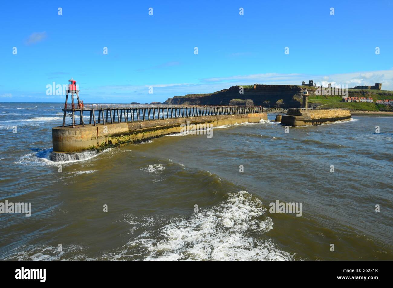 A view of Whitby harbour and the Abbey in the distance Stock Photo - Alamy