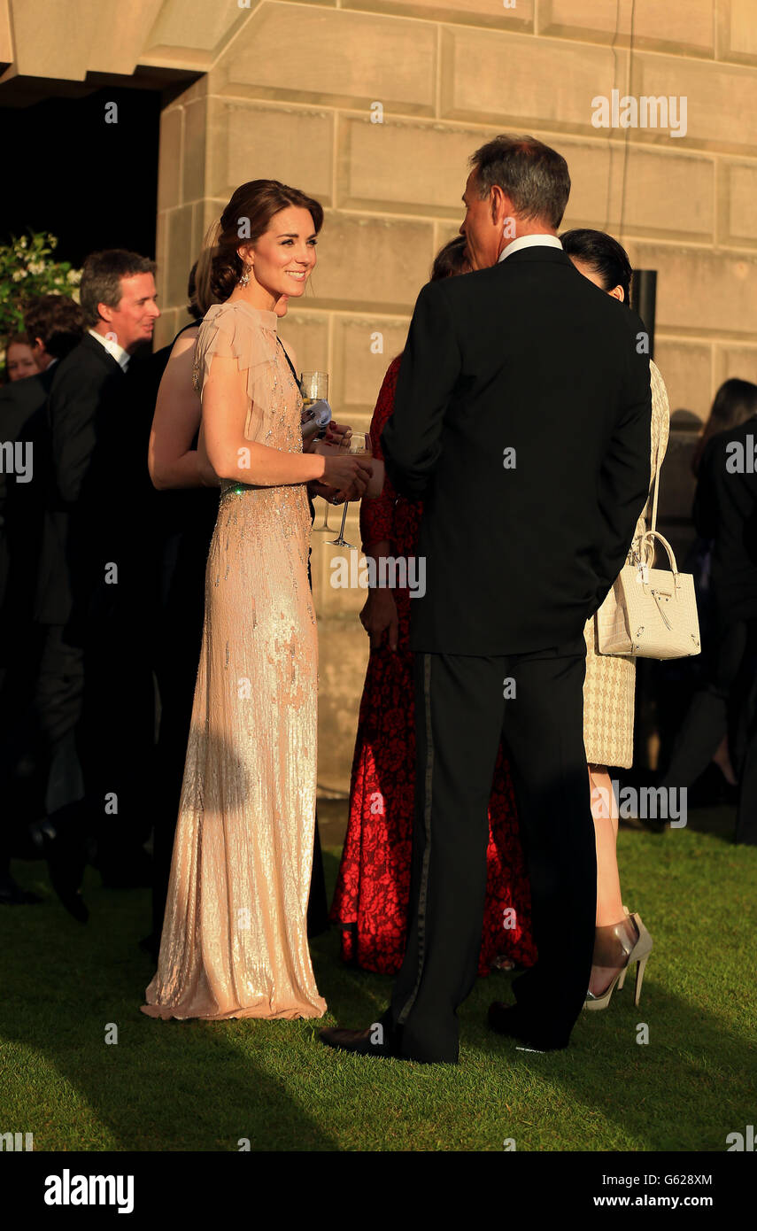 The Duchess of Cambridge speaks to EACH Ambassador Anthony Horowitz as ...