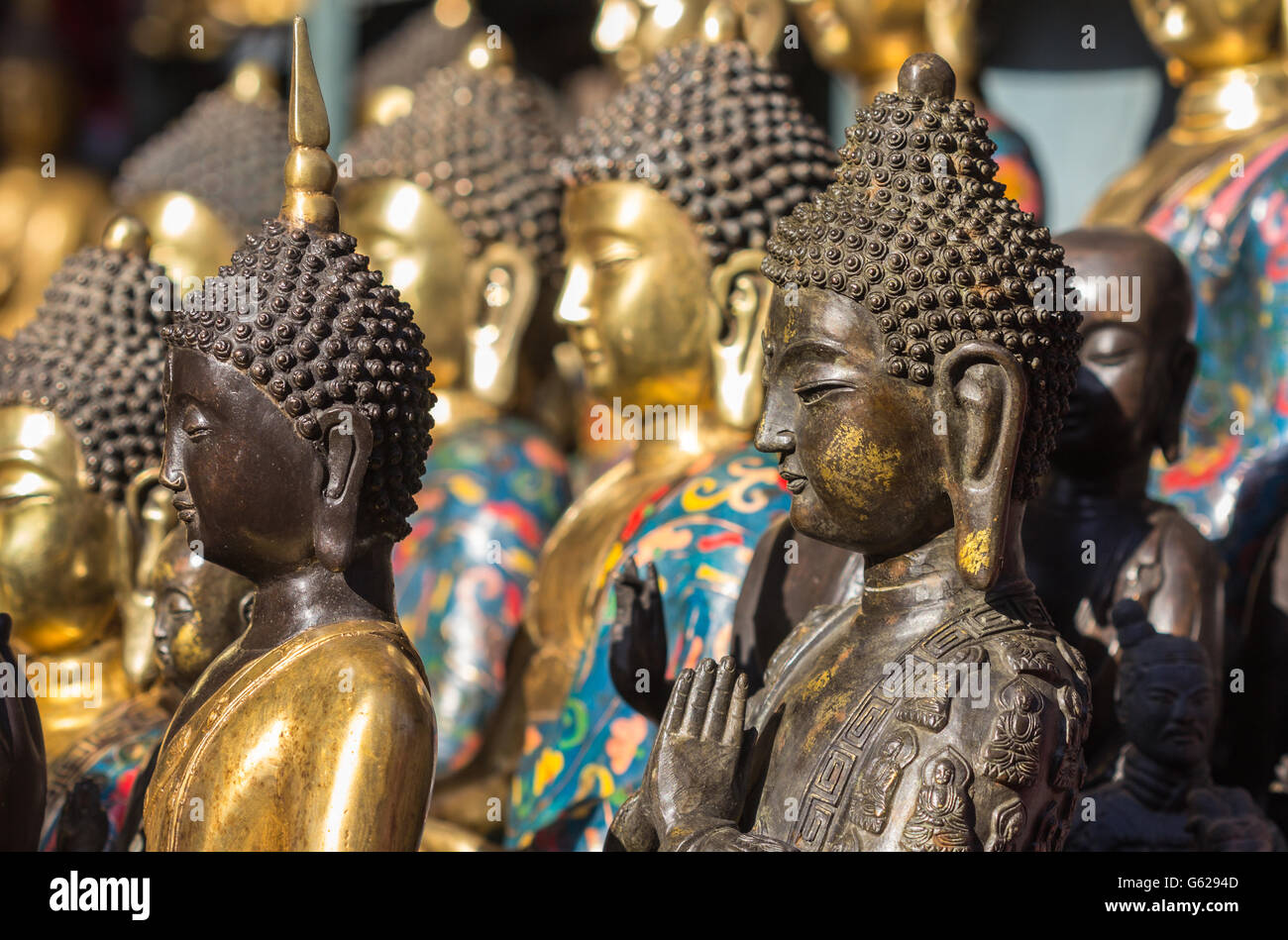 Antique Buddha statues Stock Photo - Alamy