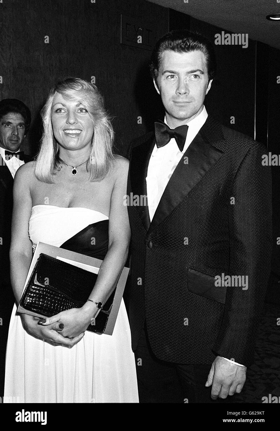 Celebrity 3 4 three quarter length tuxedo Black and White Stock Photos ...