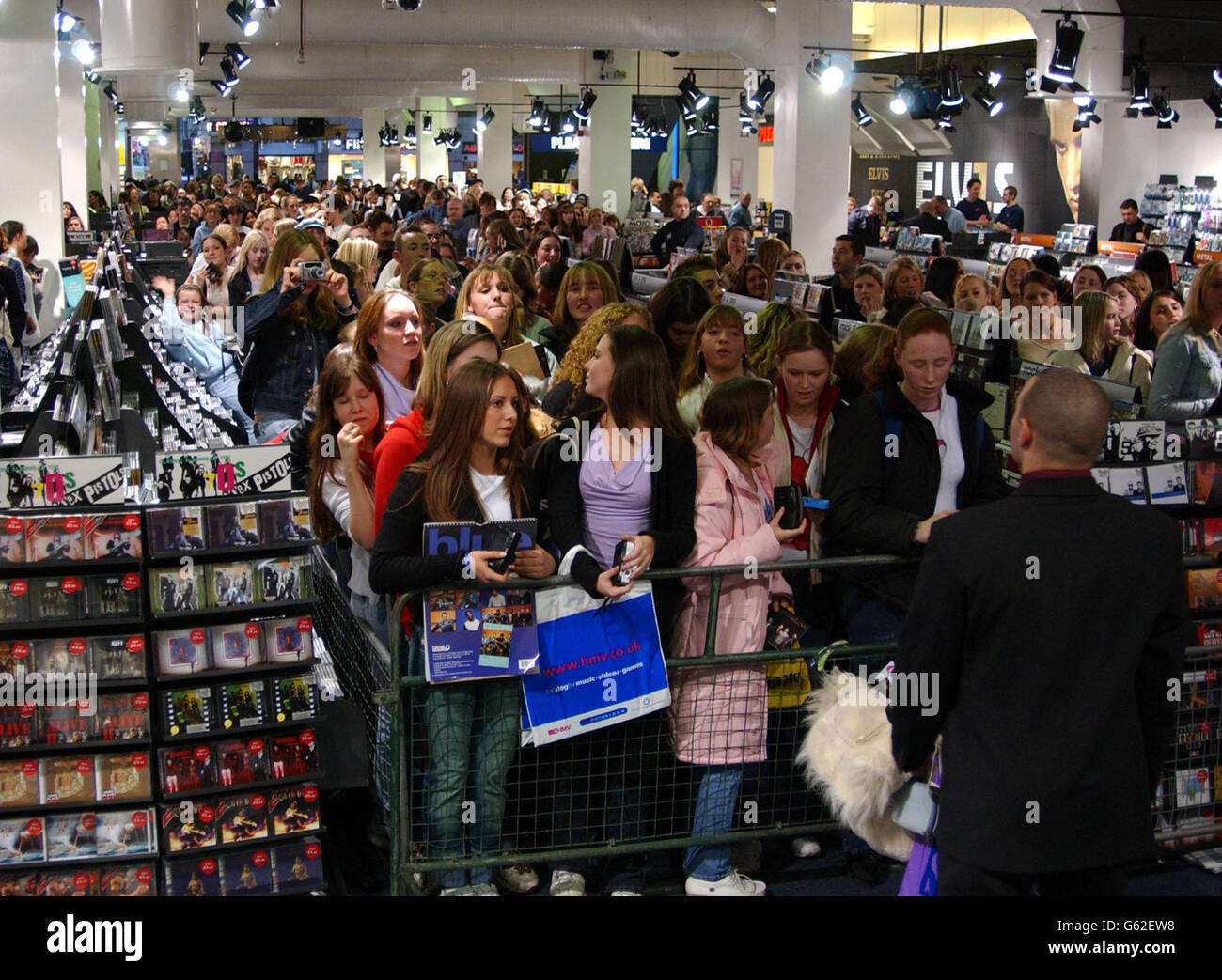 Fans queue to meet pop group Blue as they release their new album 'One ...