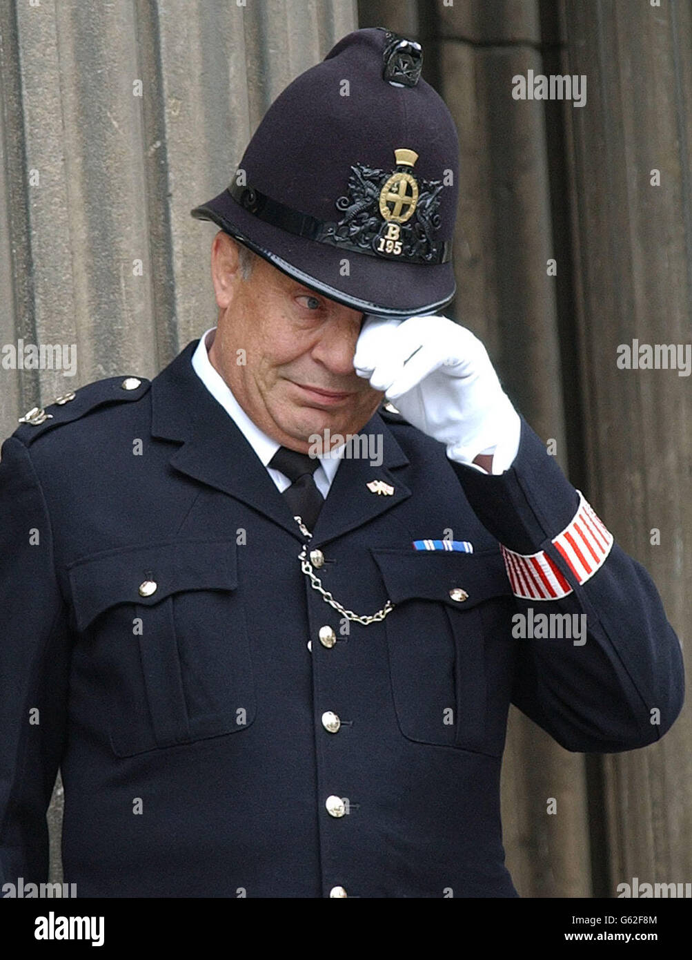 A City of London policeman on guard outside the doors of St Paul's ...