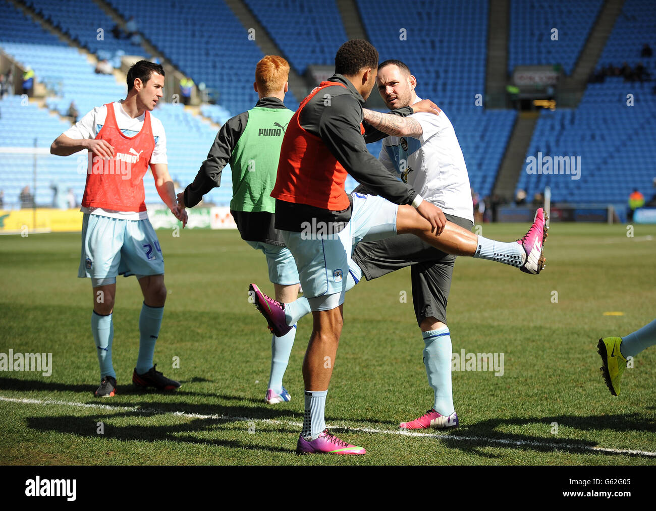 Coventry City's David Bell (right) during the warm up Stock Photo - Alamy