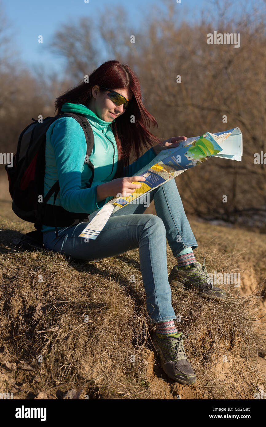 Woman with map Stock Photo - Alamy
