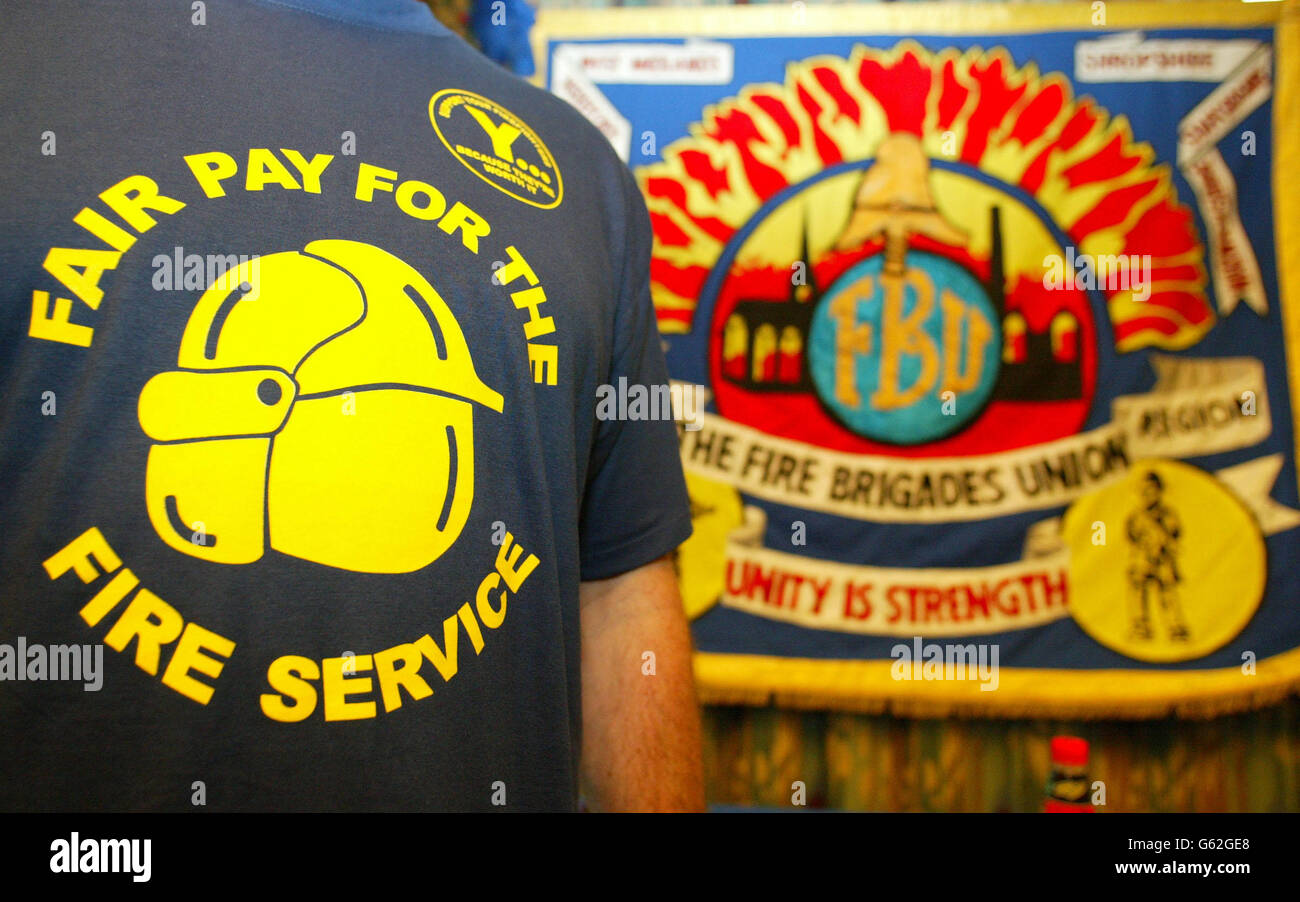 A Fire Brigade Union delegate arrives at their conference in Manchester ...
