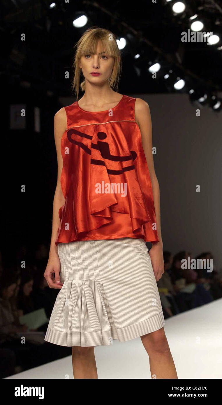 A model wearing a creation by Joe Casely-Hayford on the catwalk at the ...