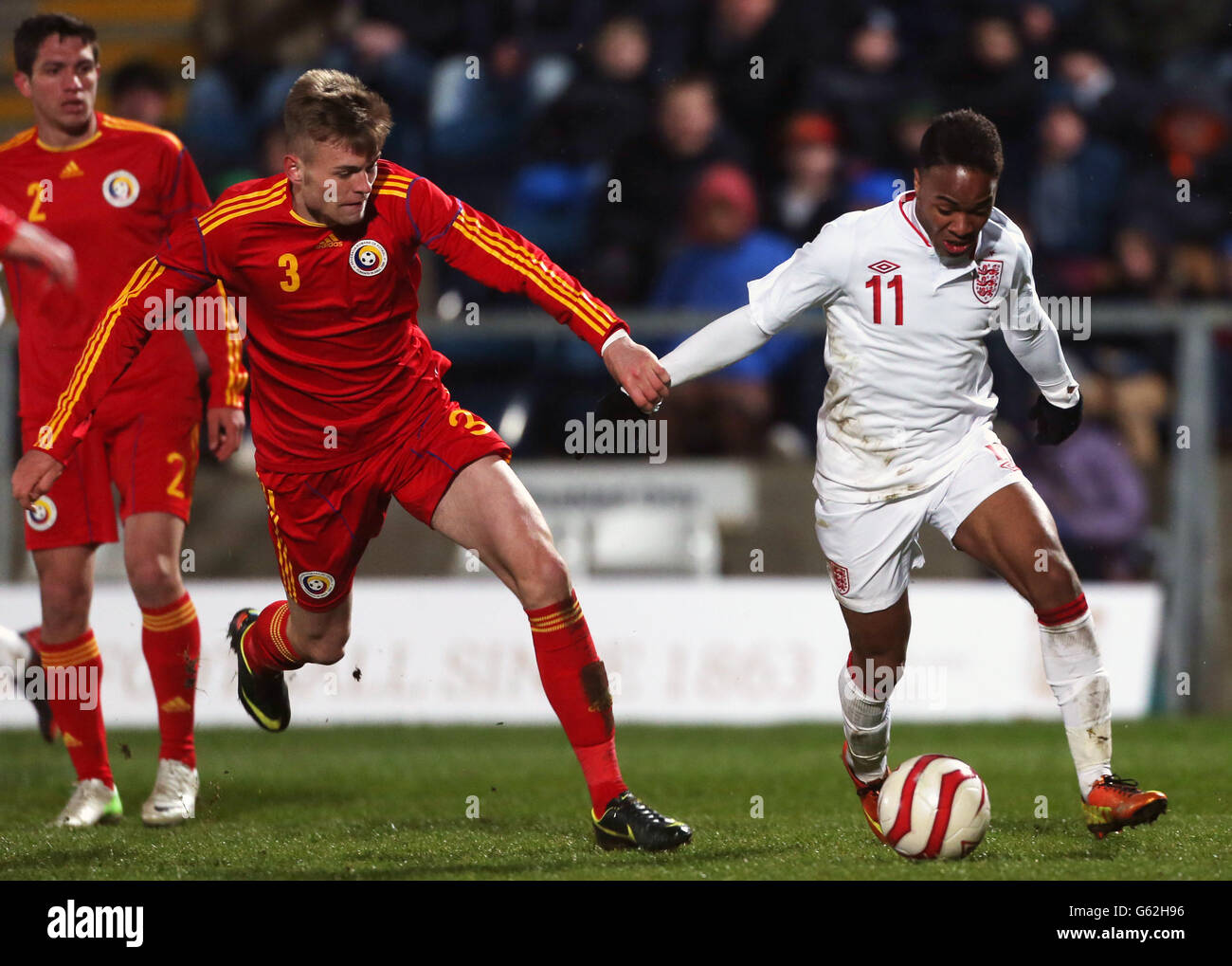 Englands raheem sterling holds off challenge from romanias cretu ...