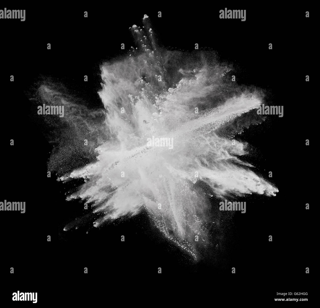White powder explosion isolated on black background Stock Photo - Alamy