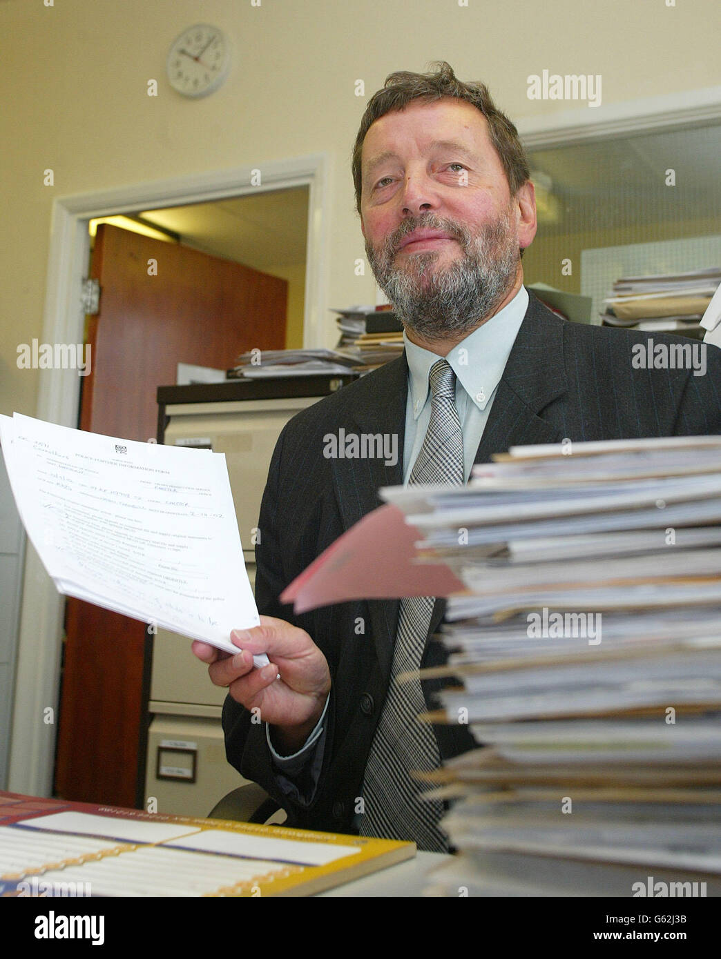Home secretary david blunkett sits with pile of police paperwork hi-res ...
