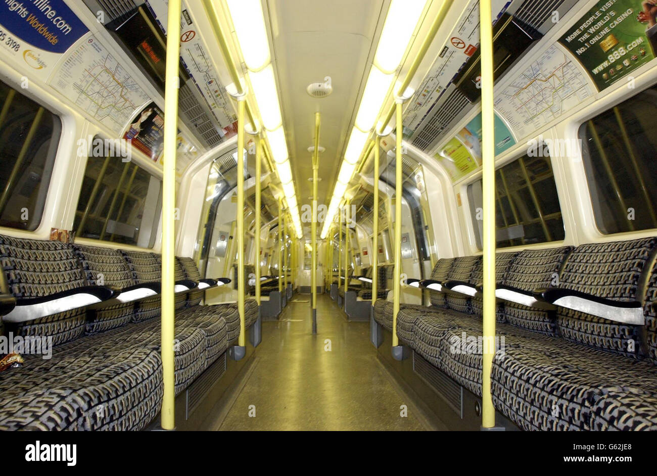 A tube carriage lies empty as London commuters leave London early in ...