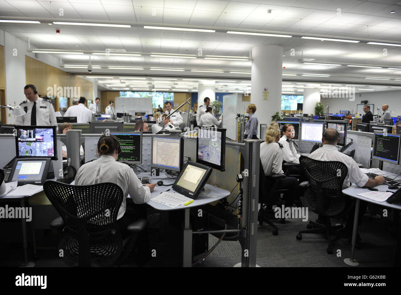 Officers watch over screens, at the Metropolitan Police's Specialist ...