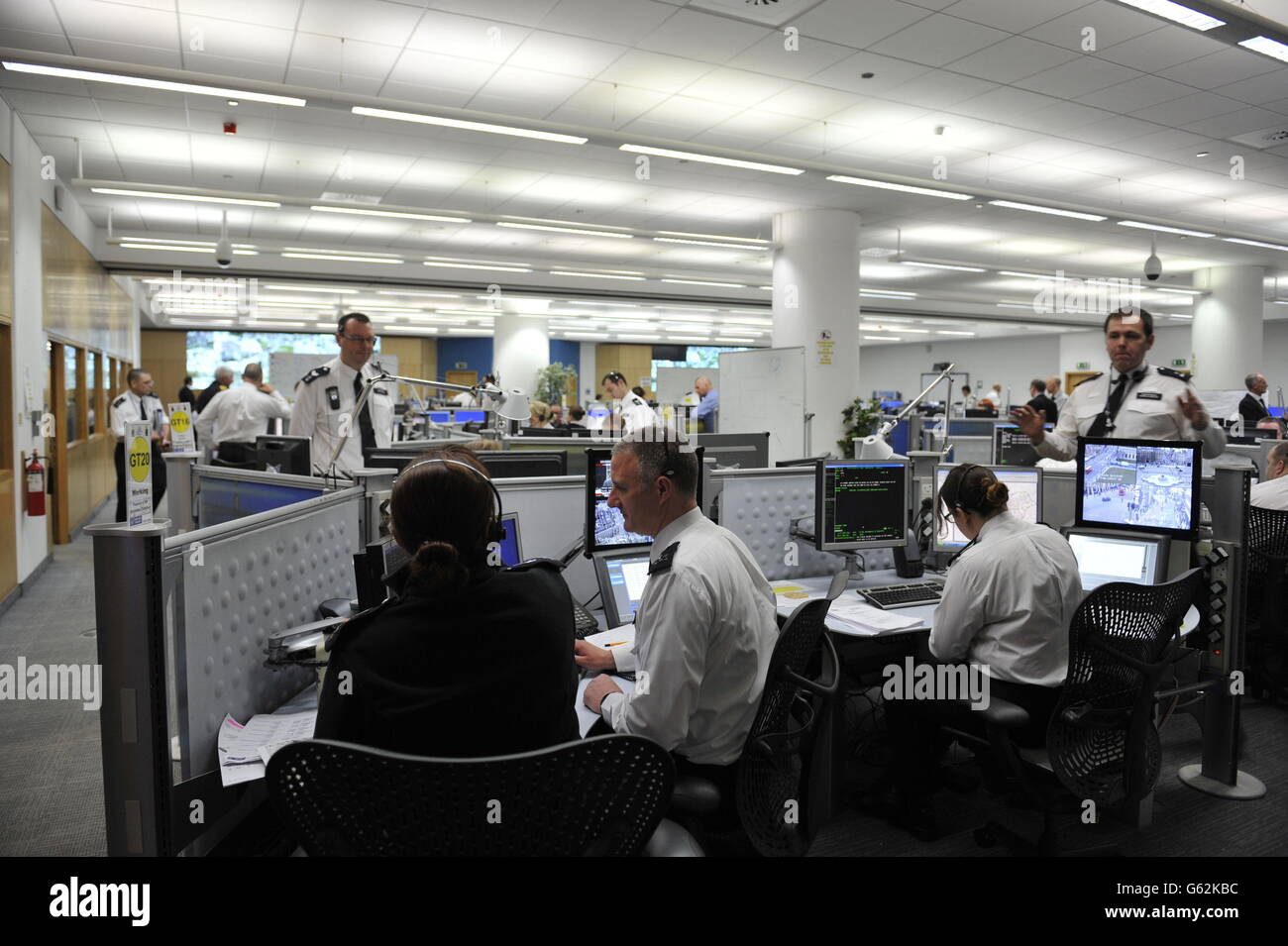 Officers watch over screens, at the Metropolitan Police's Specialist ...