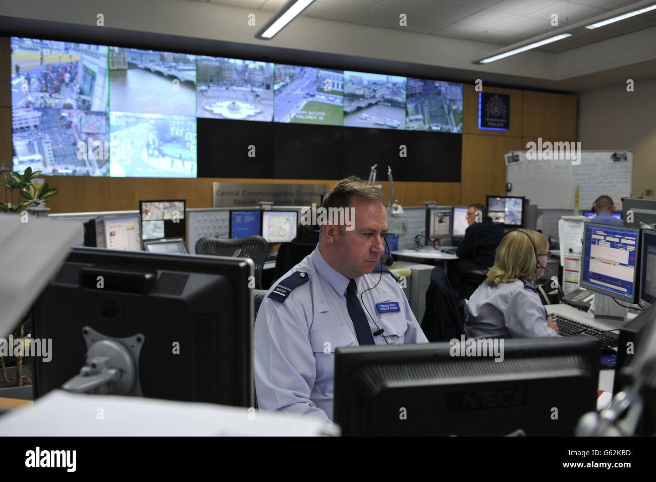 Officers watch over screens, at the Metropolitan Police's Specialist ...