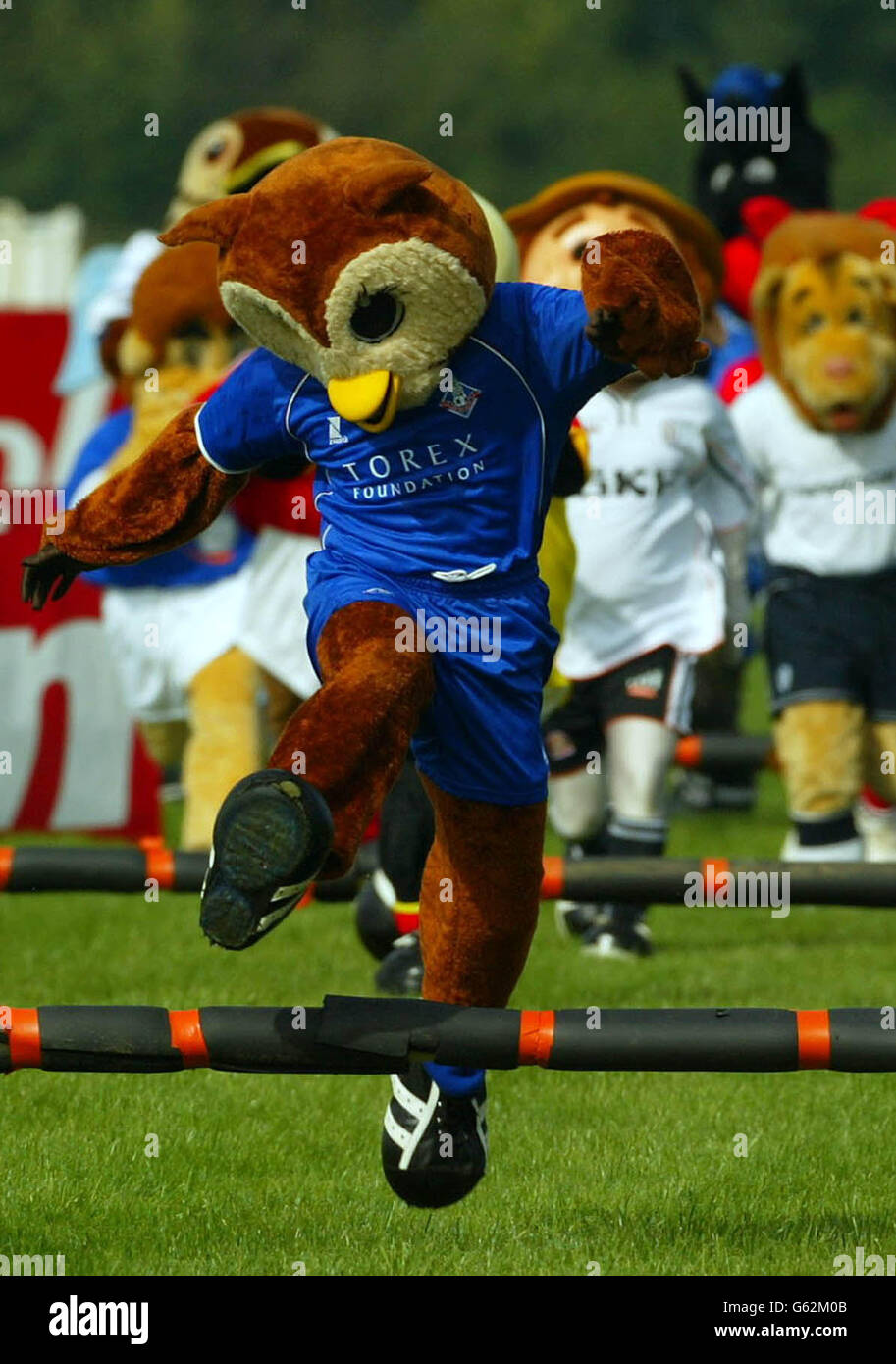 Football mascot running football hi-res stock photography and images ...