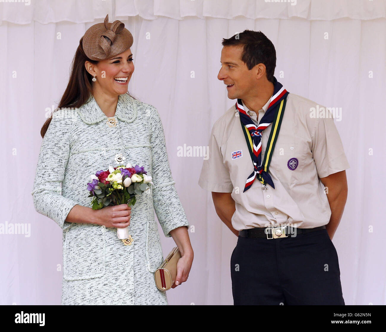 The Duchess of Cambridge with Chief Scout Bear Grylls (right) as she ...