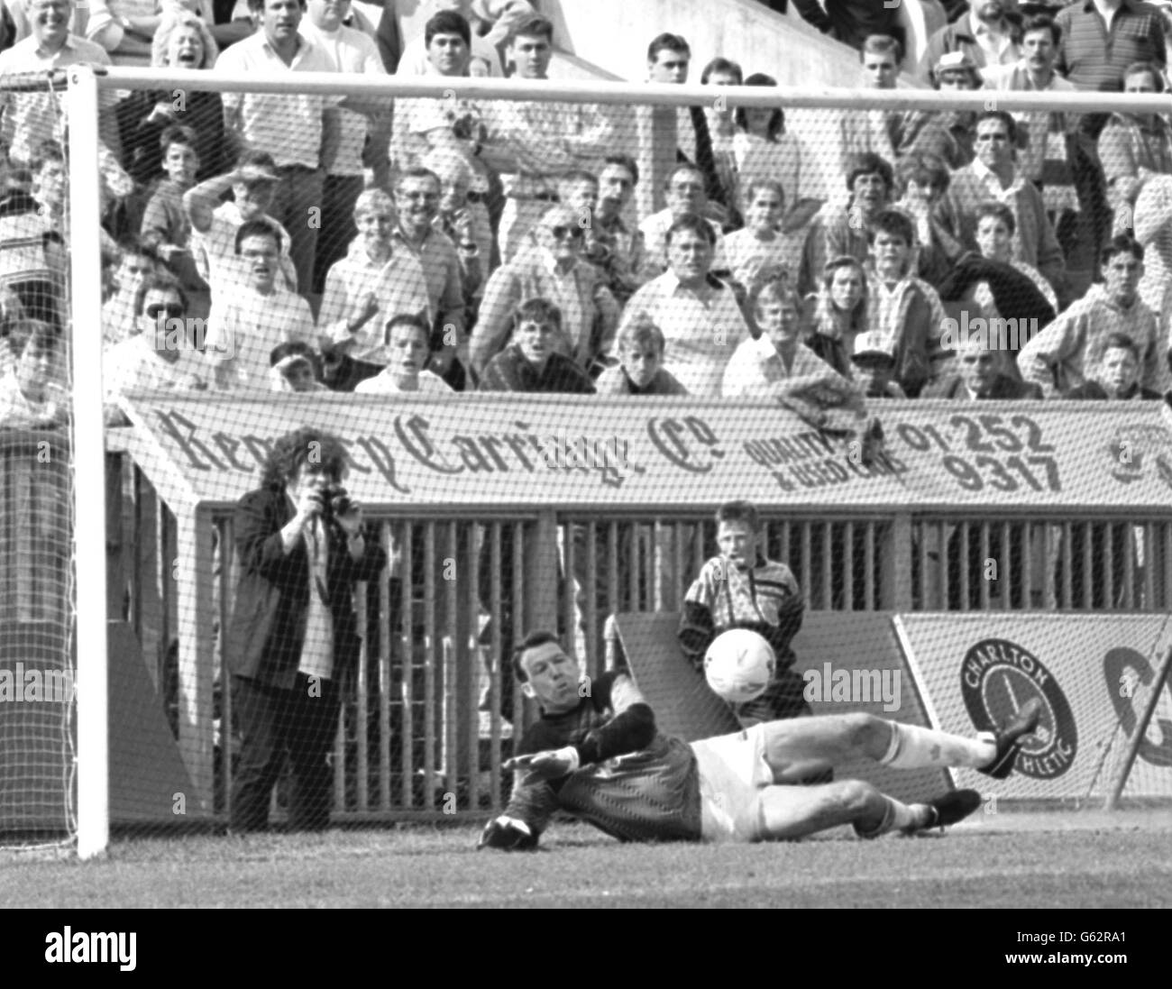 Charlton goalkeeper Bob Bolder saves the 75th minute penalty from ...