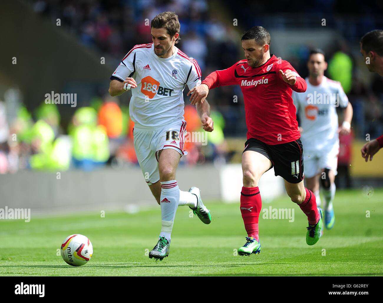 Cardiff City's Craig Conway (right) and Bolton Wanderers' Samuel ...