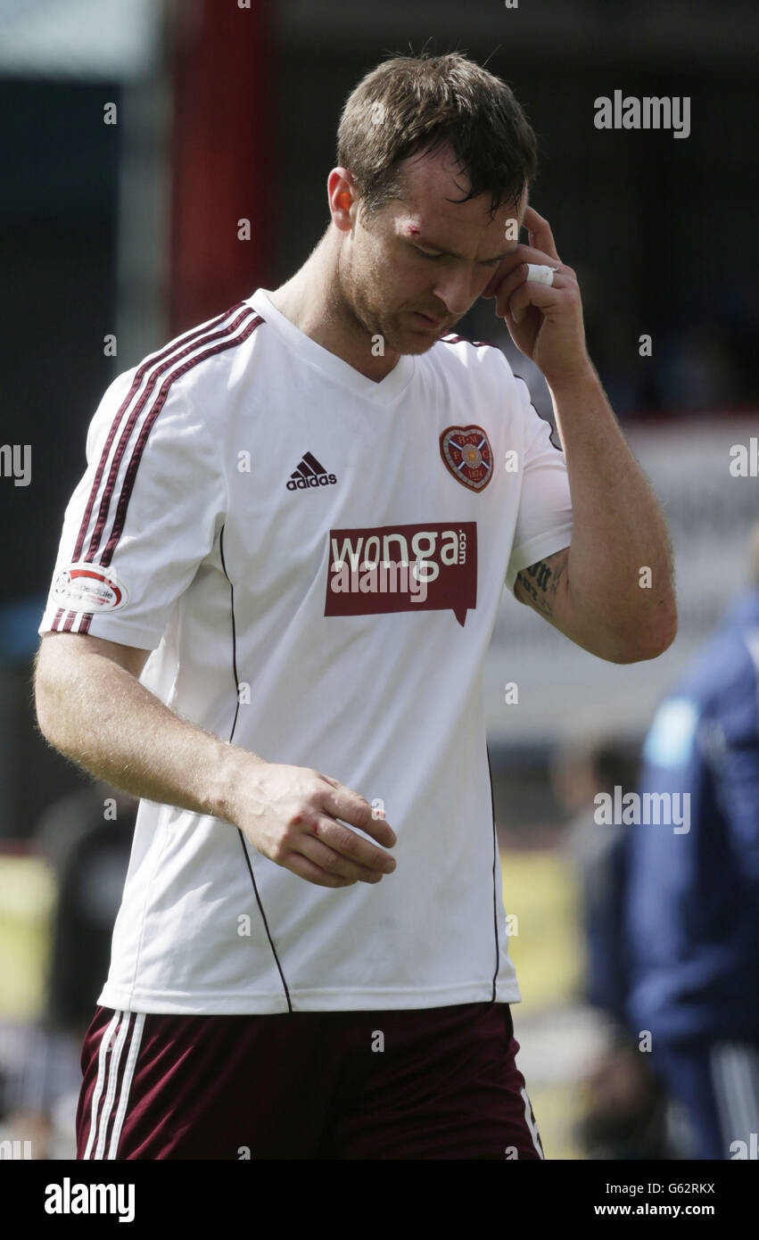 Andy Webster walks off the pitch after receiving a red card during the ...
