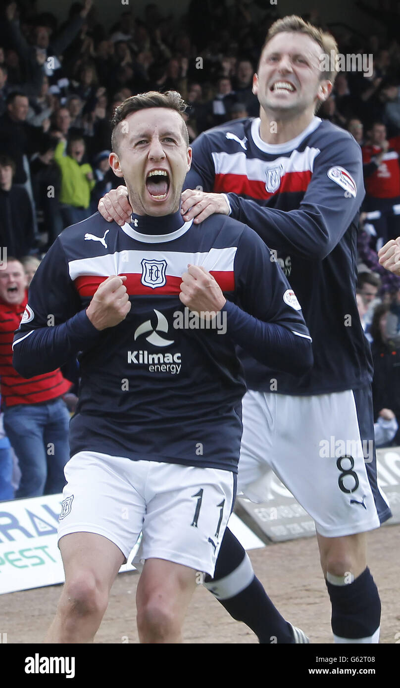 Dundee's Ryan Conroy celebrates his goal with team mate Kevin McBride ...