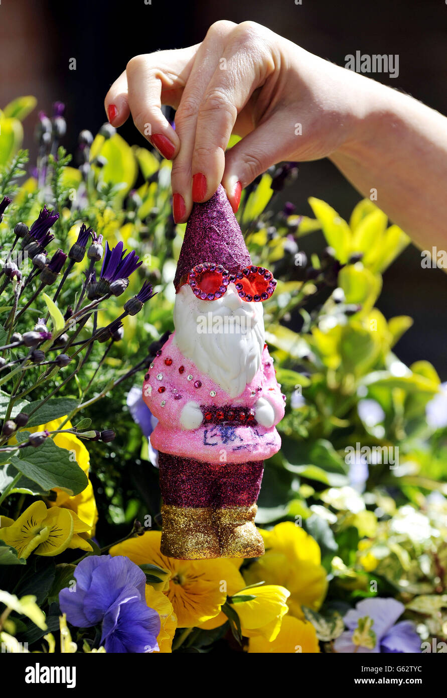 A celebrity painted gnome by singer Sir Elton John, prior to being ...