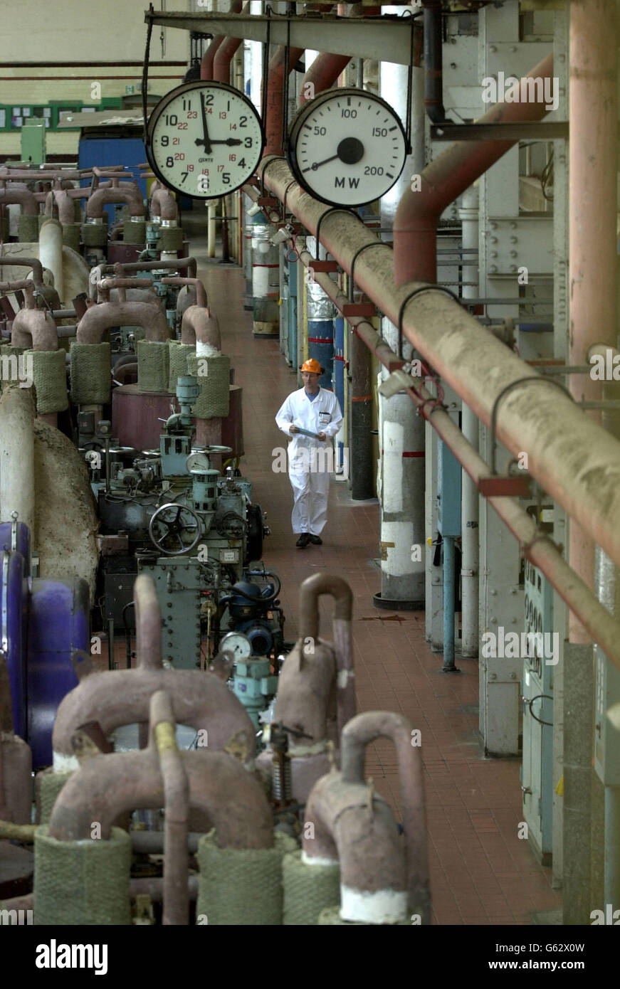 A Charge Engineer walks through the main turbine hall at Lots Road ...